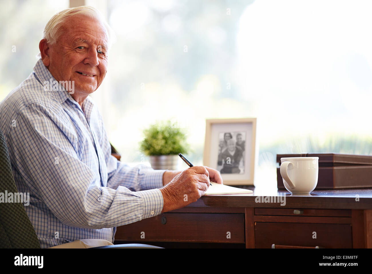 Man writing book hi-res stock photography and images - Alamy