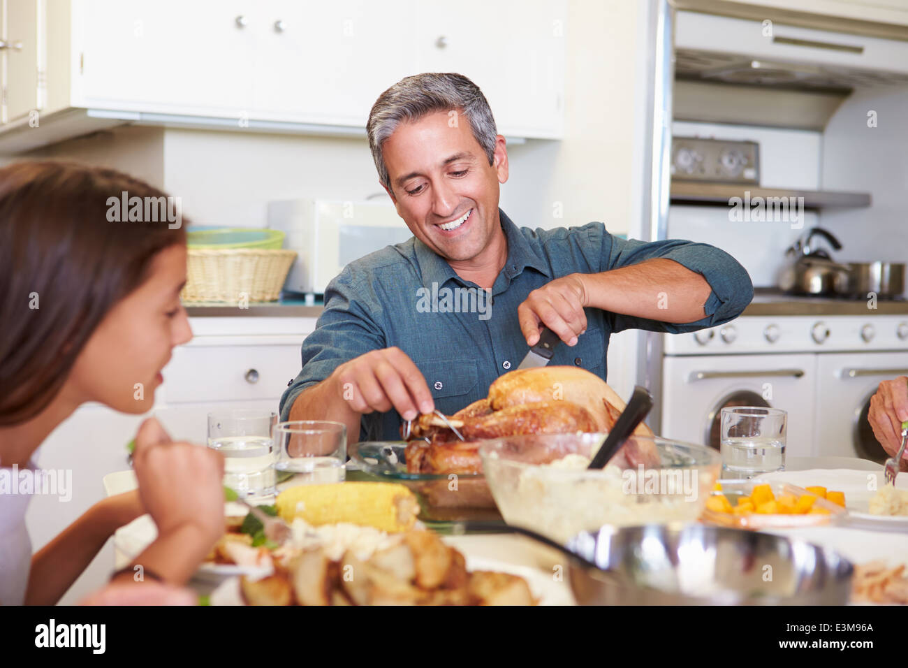 Teenage boy at family dinner table hi-res stock photography and images ...