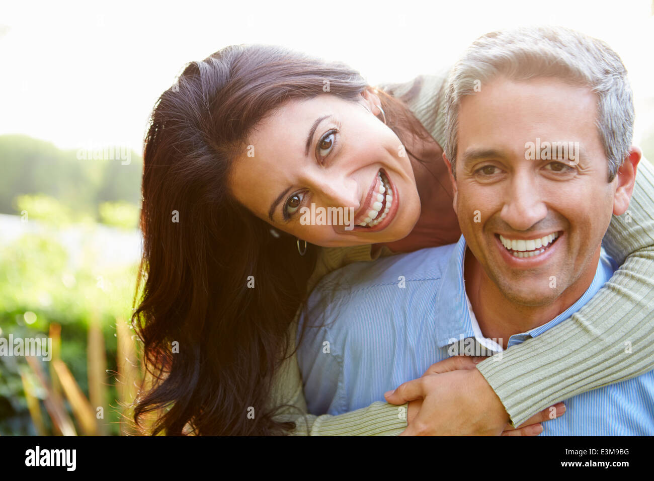 Portrait Of Loving Hispanic Couple In Countryside Stock Photo - Alamy