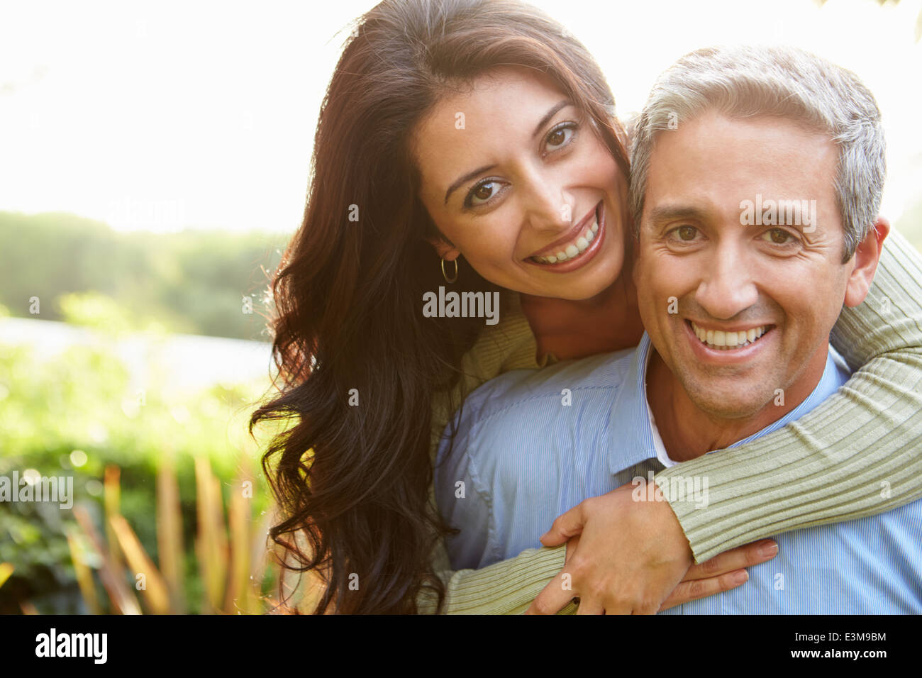 Portrait Of Loving Hispanic Couple In Countryside Stock Photo - Alamy