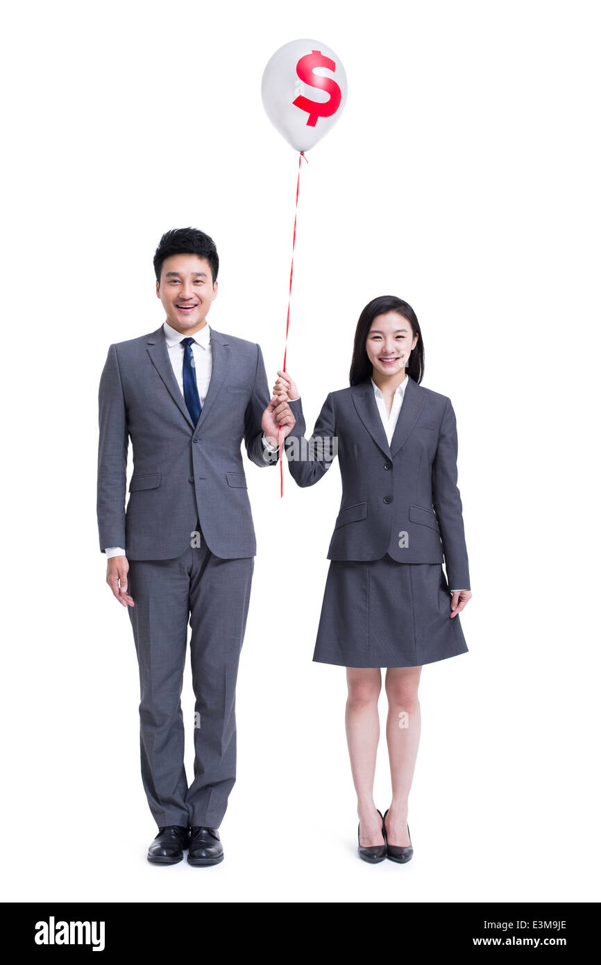 Business partners with balloon in hand Stock Photo - Alamy
