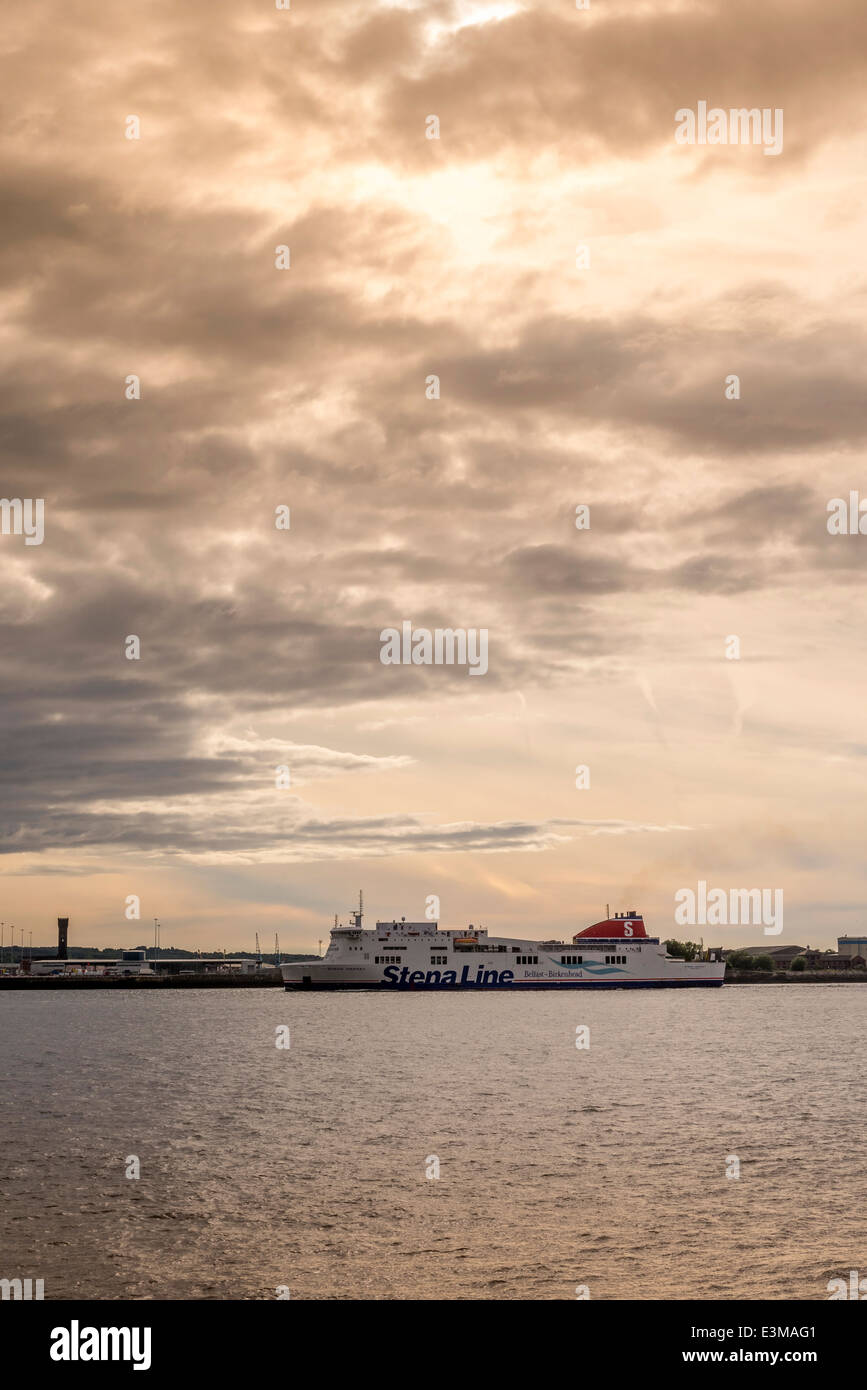 A Stenna line ro-ro ferry at 12 quays in the evening glow looking ...