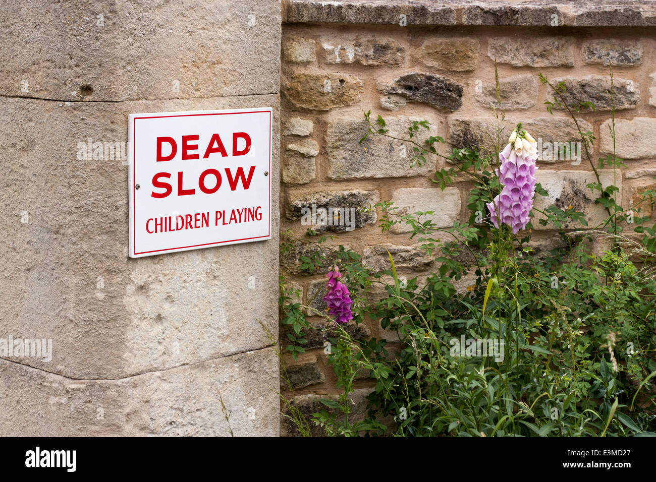 Children playing sign warning painted hi-res stock photography and ...