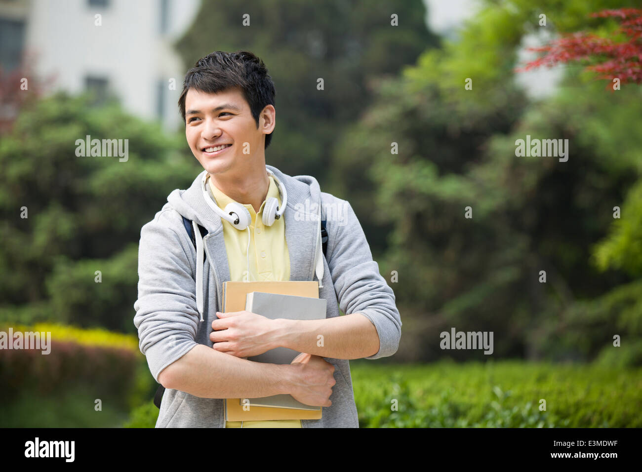 Male college student on campus Stock Photo - Alamy