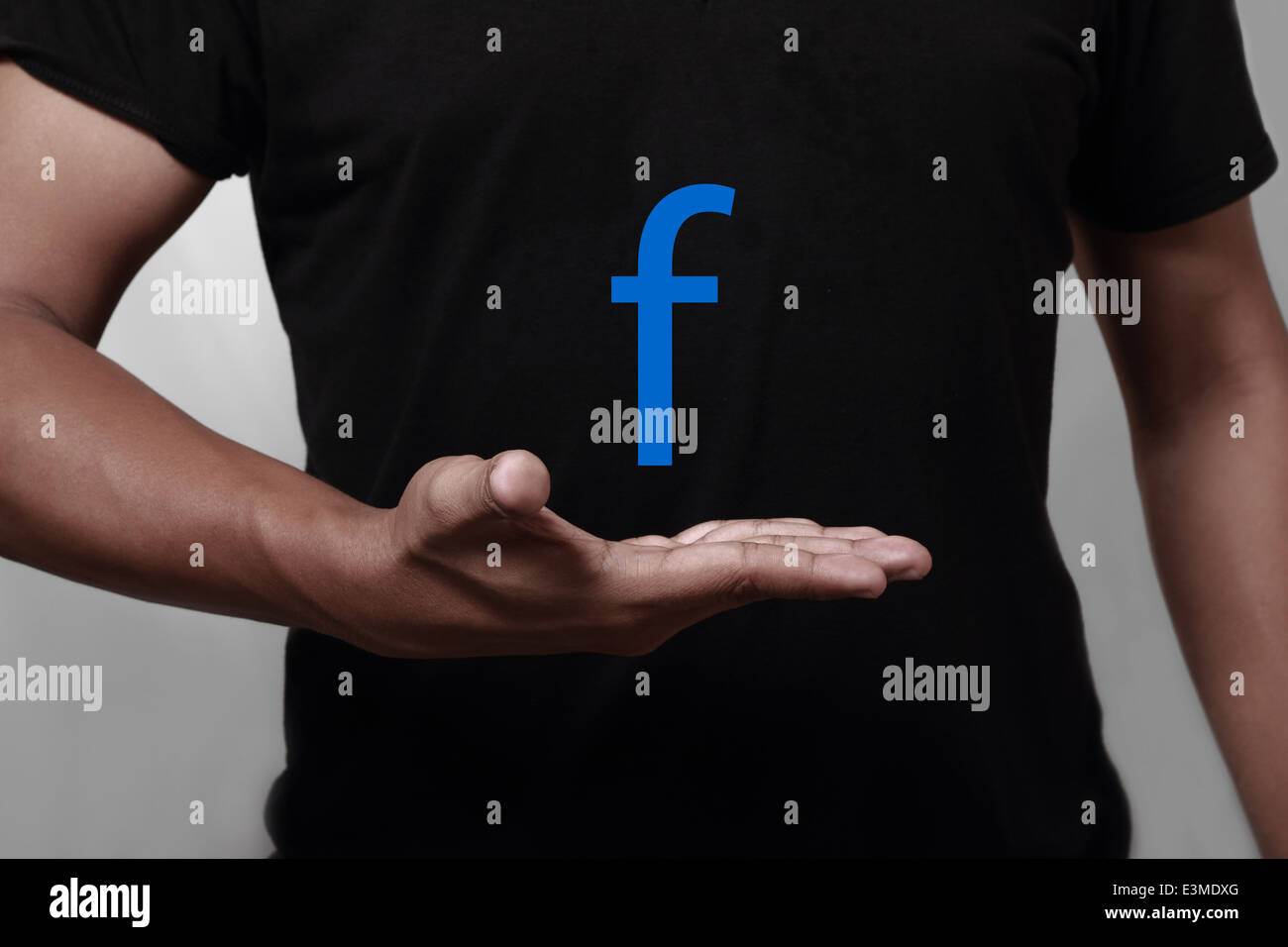 Hand showing blue color f icon Stock Photo - Alamy