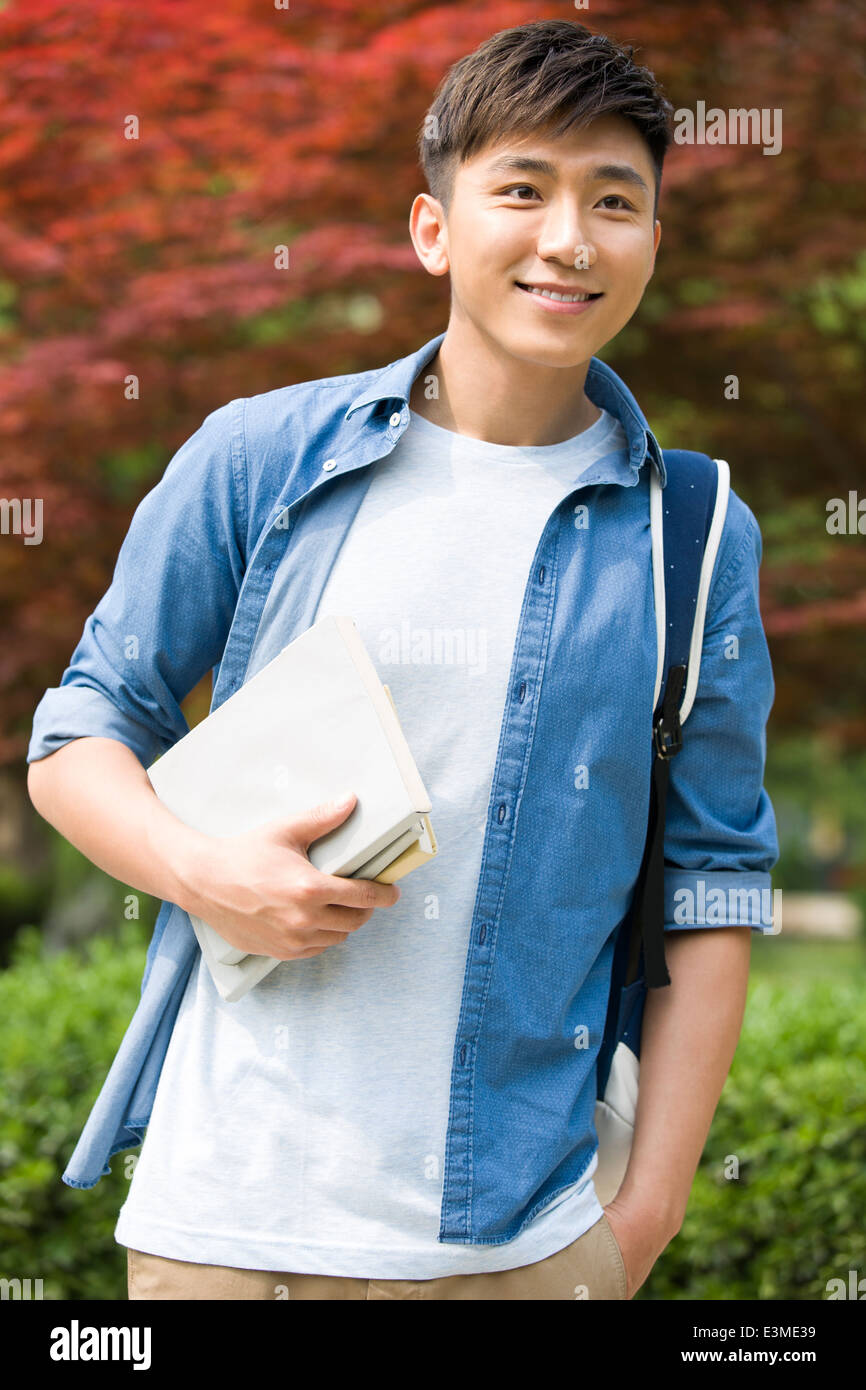 Male college student on campus Stock Photo - Alamy
