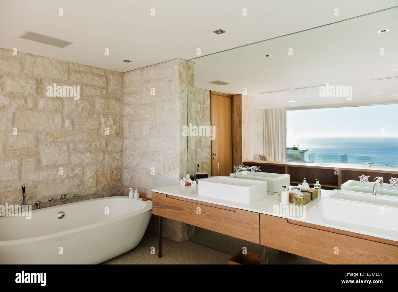 Modern bathroom with ocean view Stock Photo - Alamy