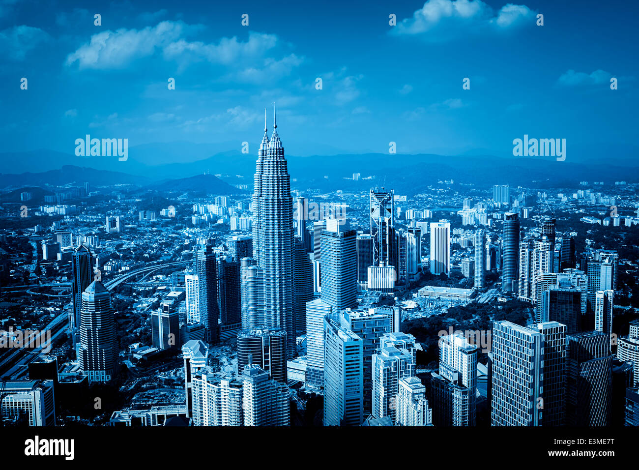 Kuala Lumpur skyline with the Petronas Towers and other skyscrapers ...