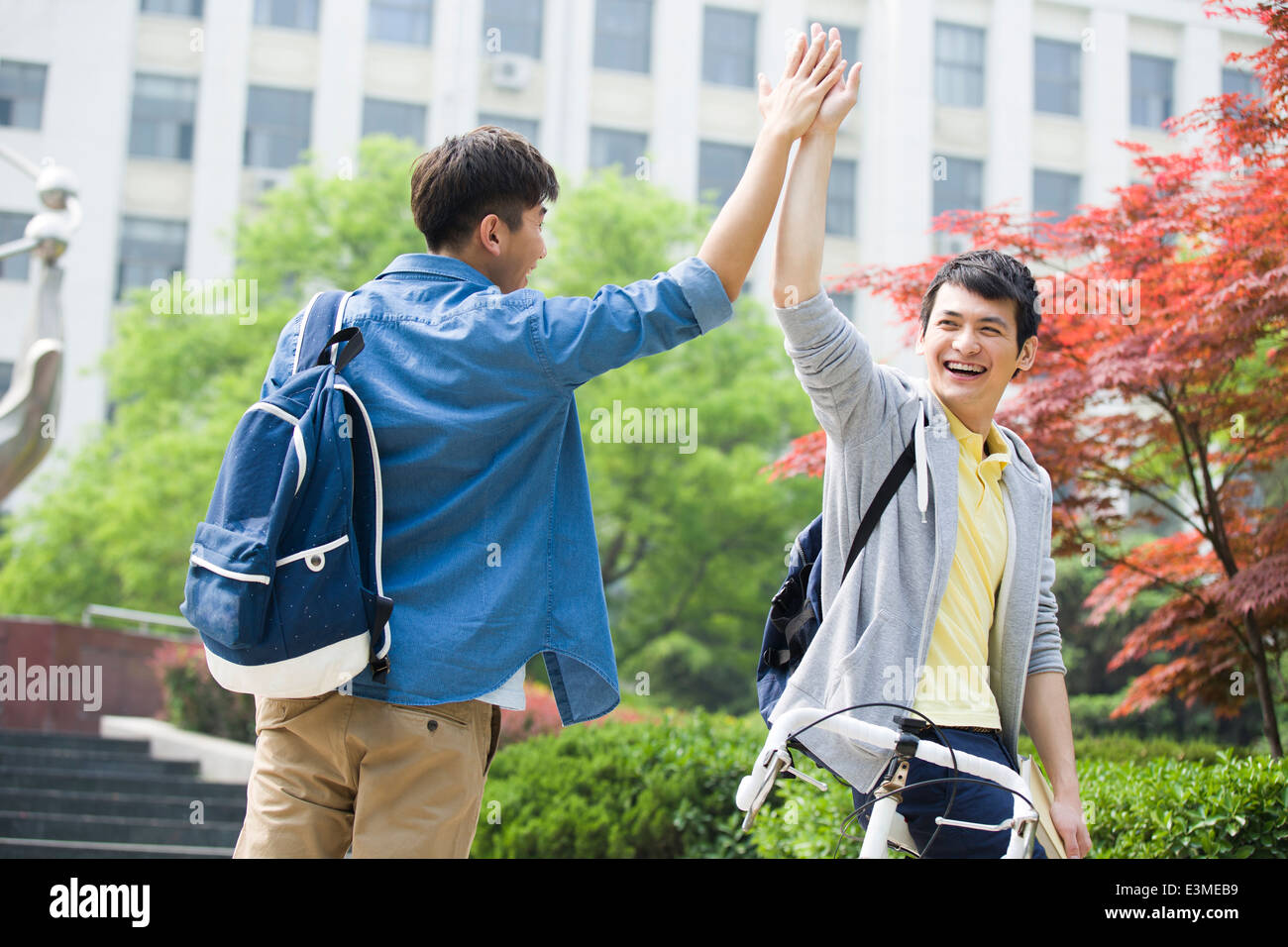 Two boys talking college hi-res stock photography and images - Alamy