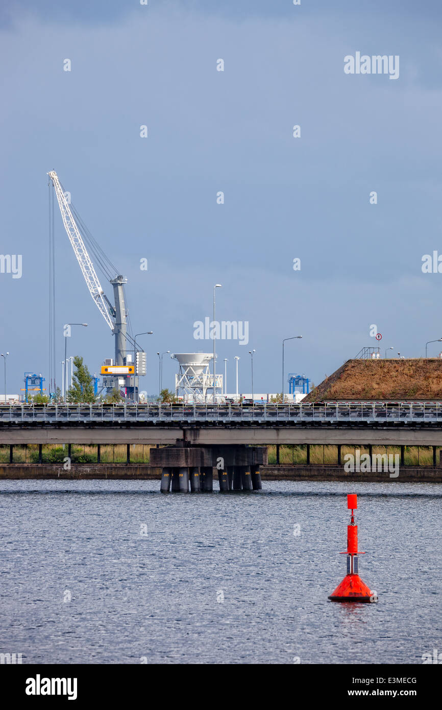 Port quay with buoy and crane in the background Stock Photo - Alamy