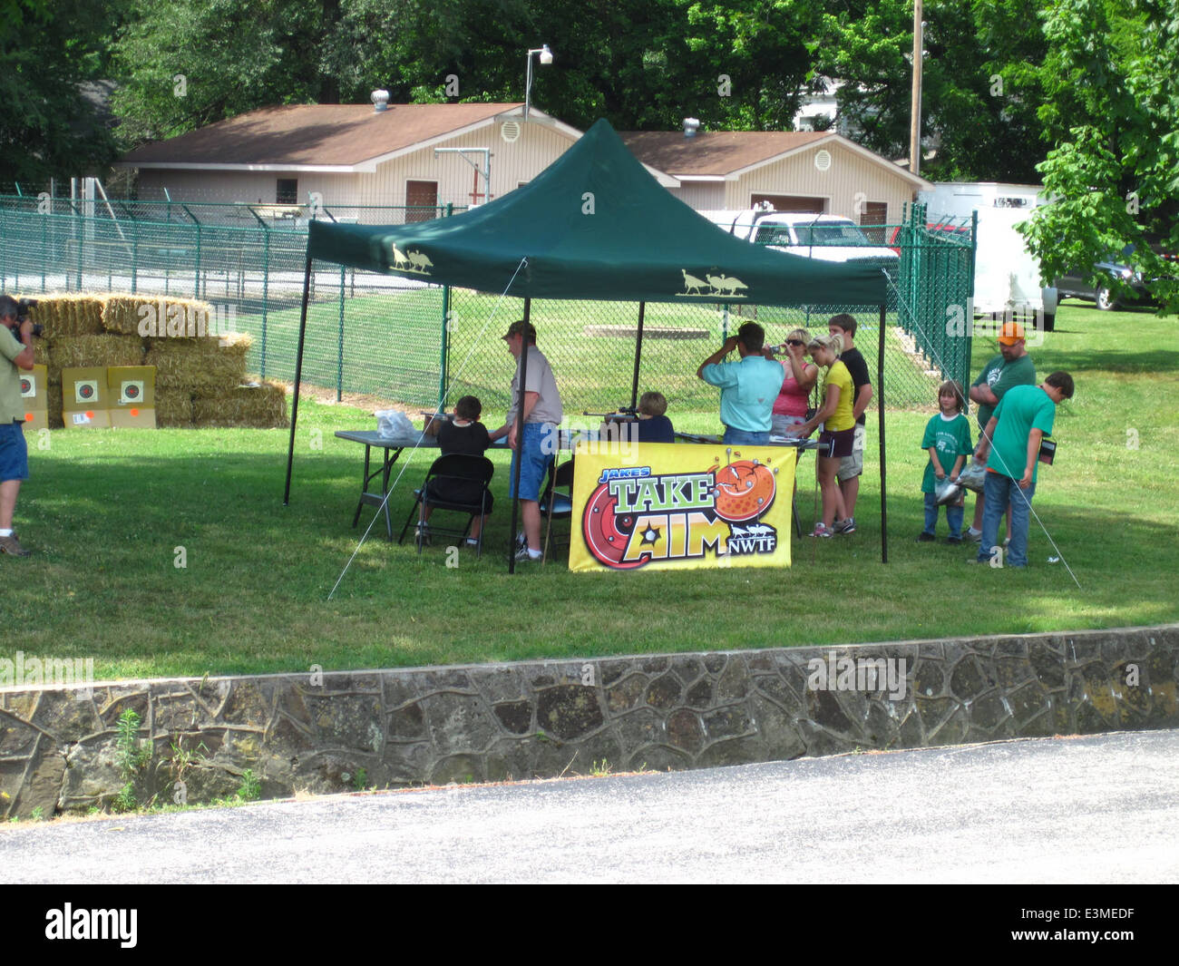 At the National Fish Hatchery in Joplin, Missouri, employees engage in ...