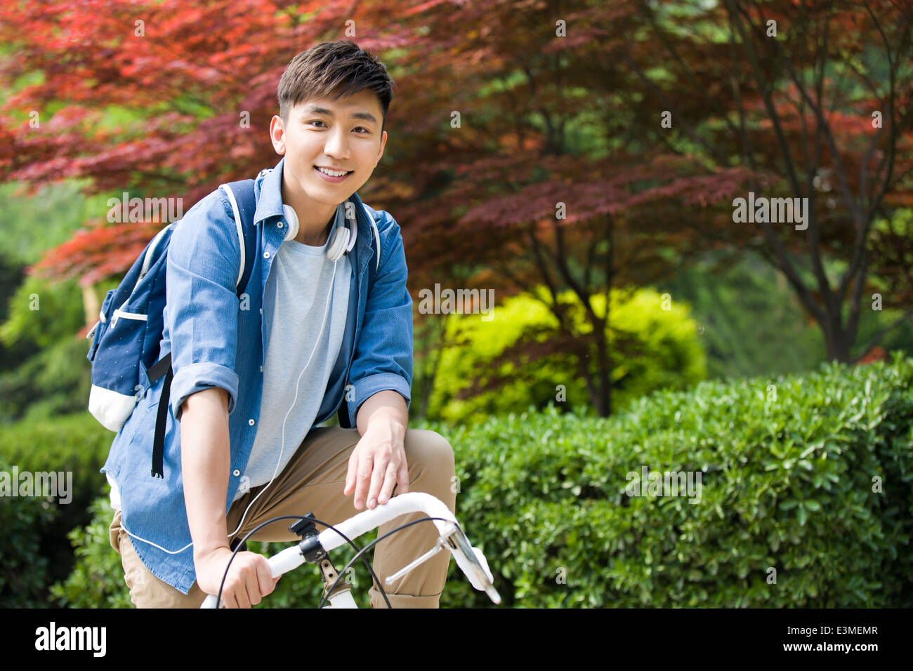 Male college student bicycle hi-res stock photography and images - Alamy