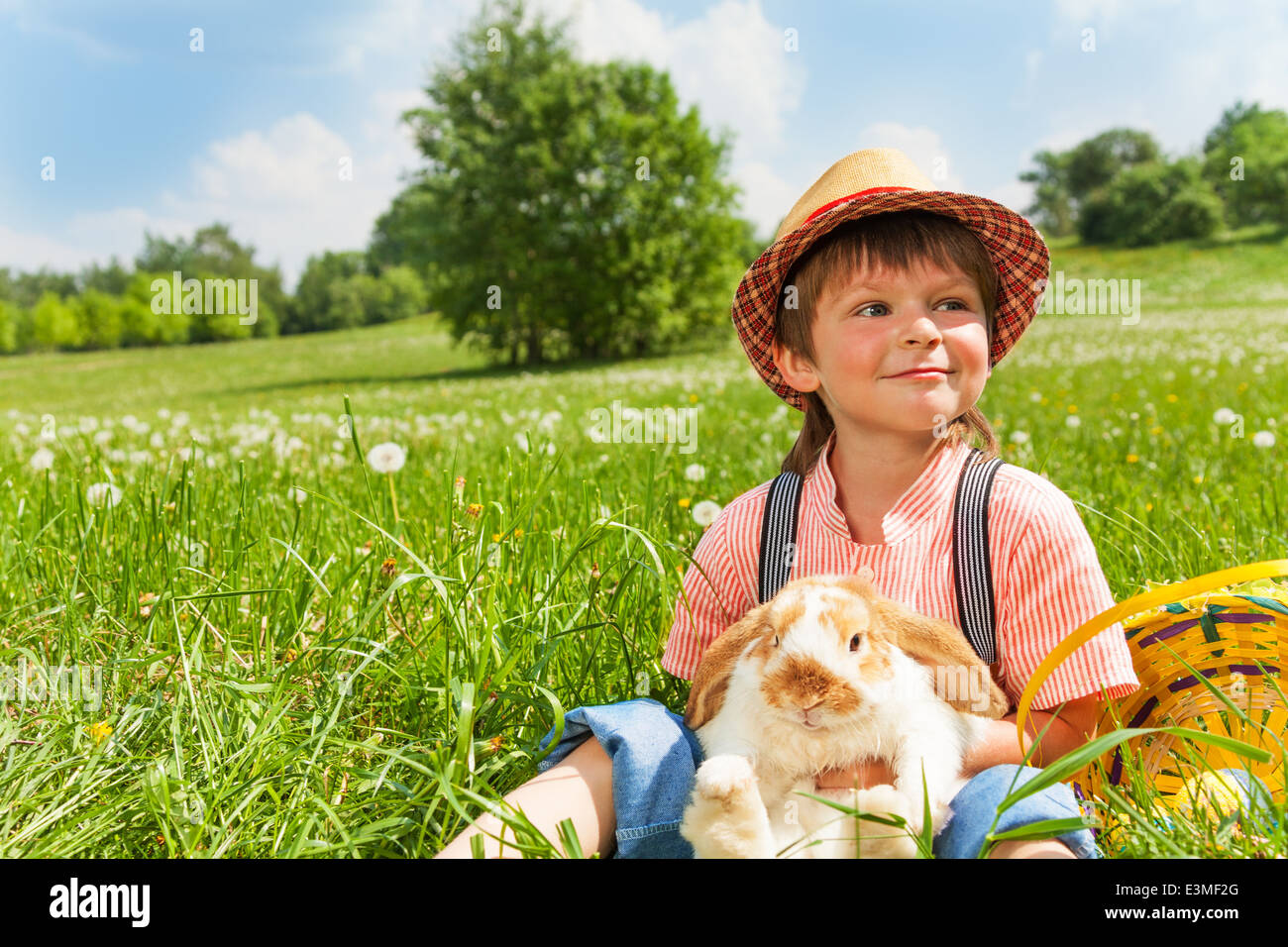 Happy boy in hat with rabbit hi-res stock photography and images - Alamy