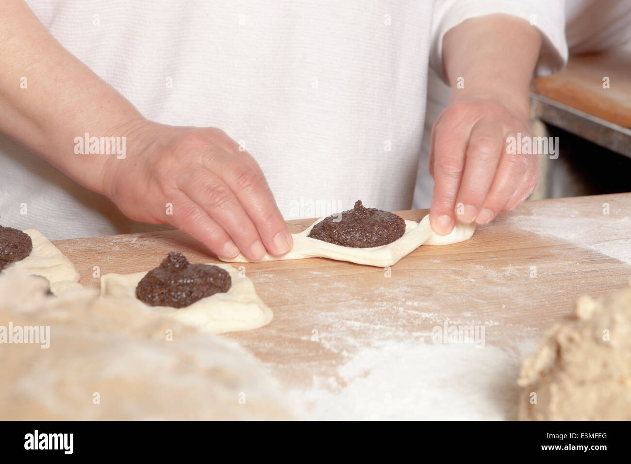 Professional Bakery - Baker Making Sweet Pastry Stock Photo - Alamy