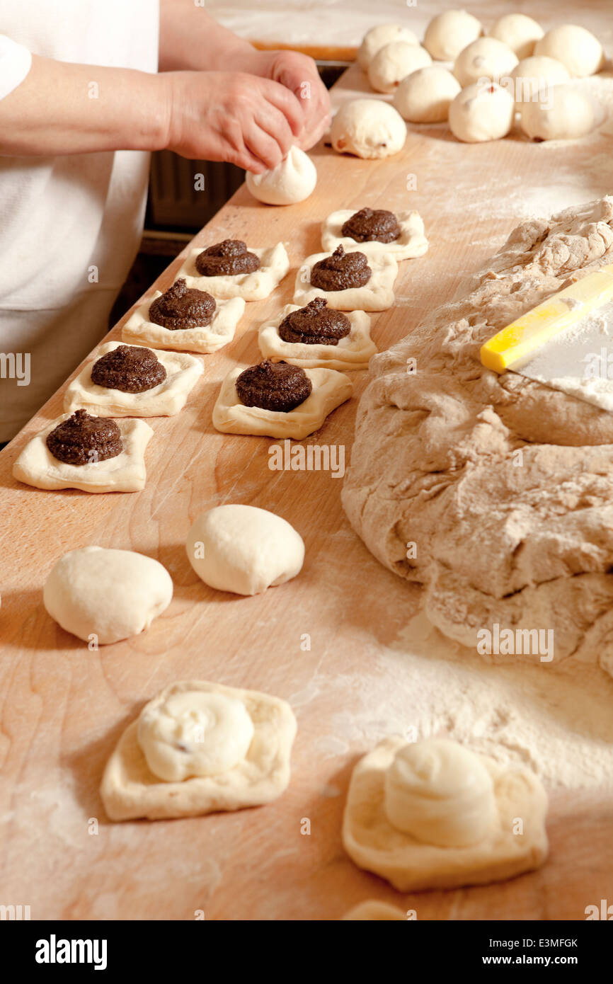 Professional Bakery - Baker Making Sweet Pastry Stock Photo - Alamy