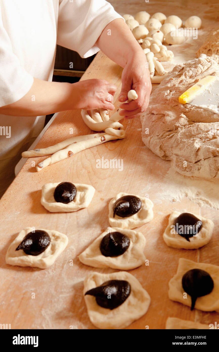 Professional Bakery - Baker Making Sweet Pastry Stock Photo - Alamy