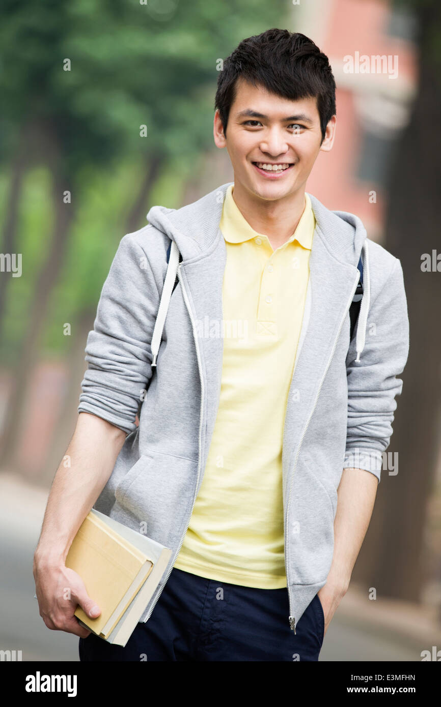 Male college student on campus Stock Photo - Alamy
