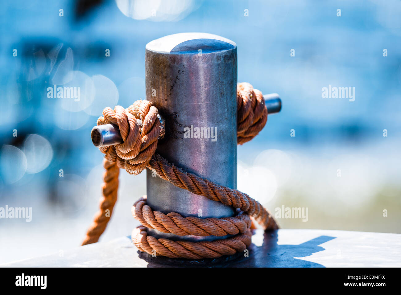 Abstract: Bollard and rope Stock Photo - Alamy