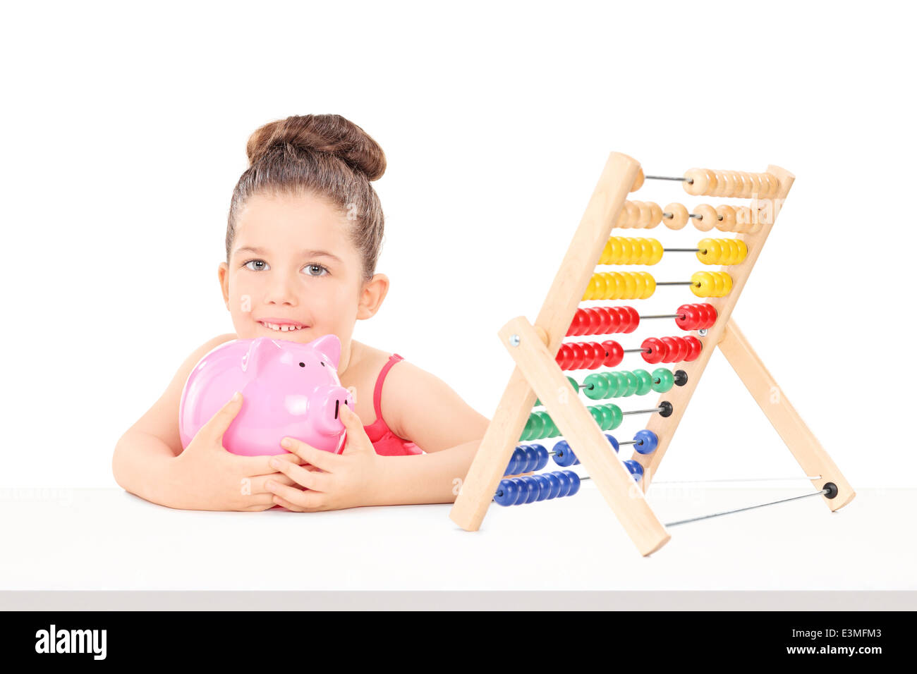 Little girl counting her savings on an abacus Stock Photo - Alamy