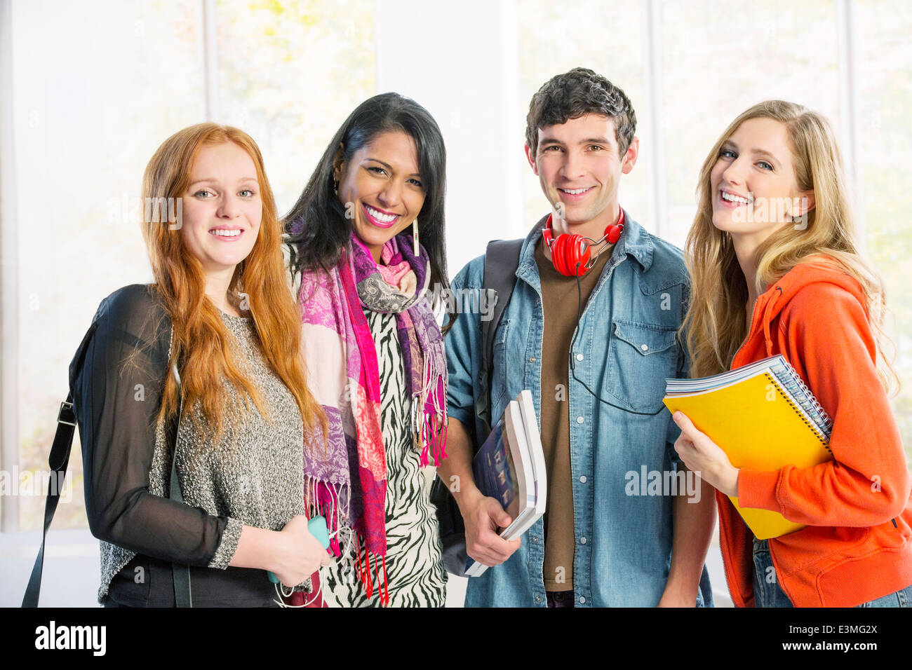 Portrait of smiling college students Stock Photo - Alamy