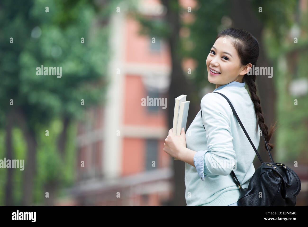Female college student on campus Stock Photo - Alamy