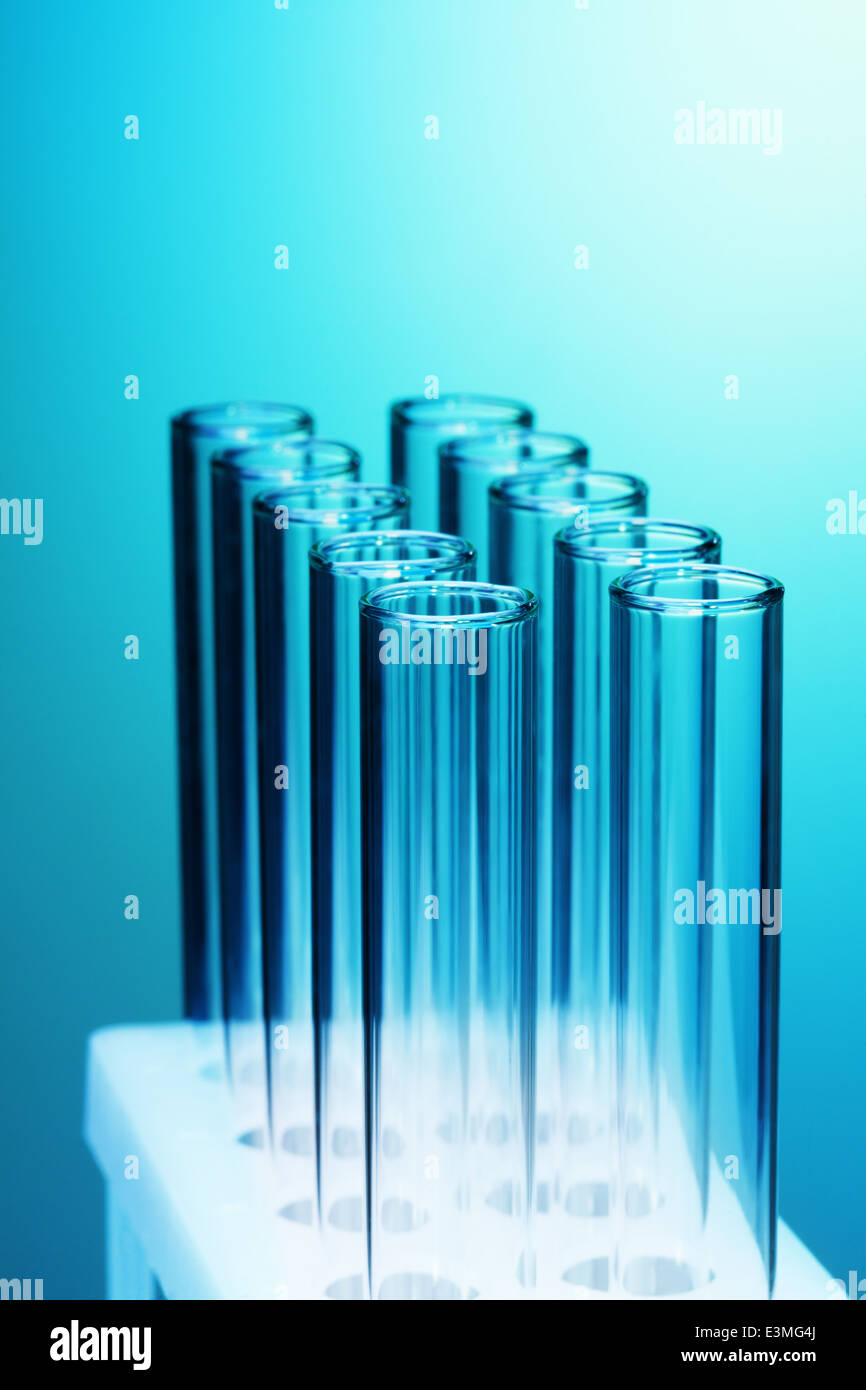 Rows of empty test tubes fixed together Stock Photo - Alamy