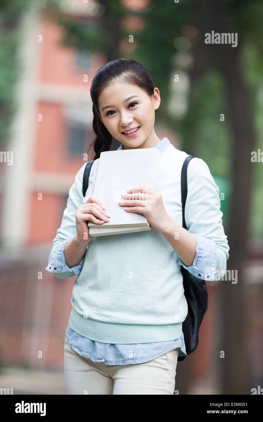 Female college student on campus Stock Photo - Alamy