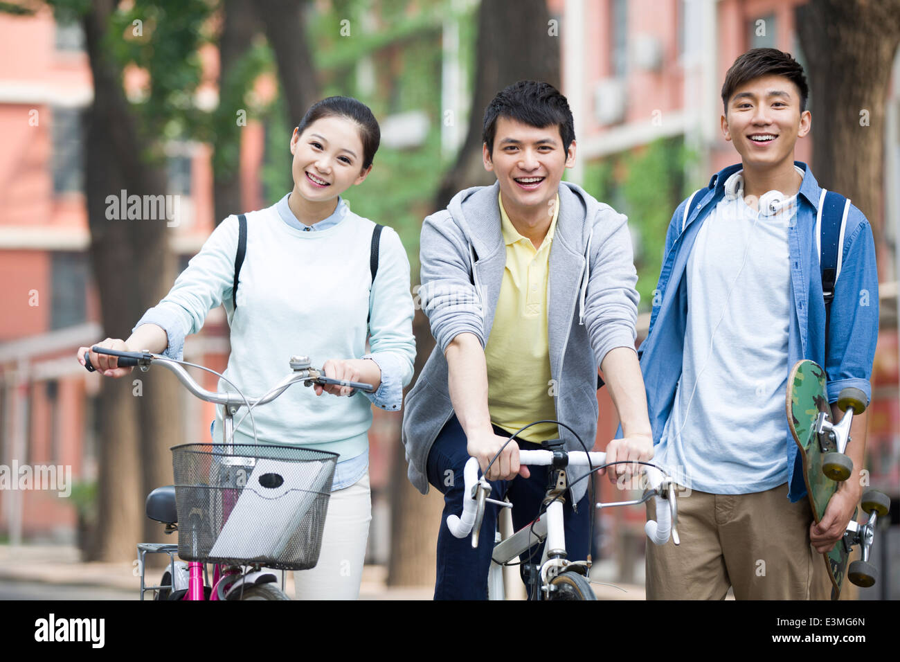 Happy college students on campus Stock Photo - Alamy