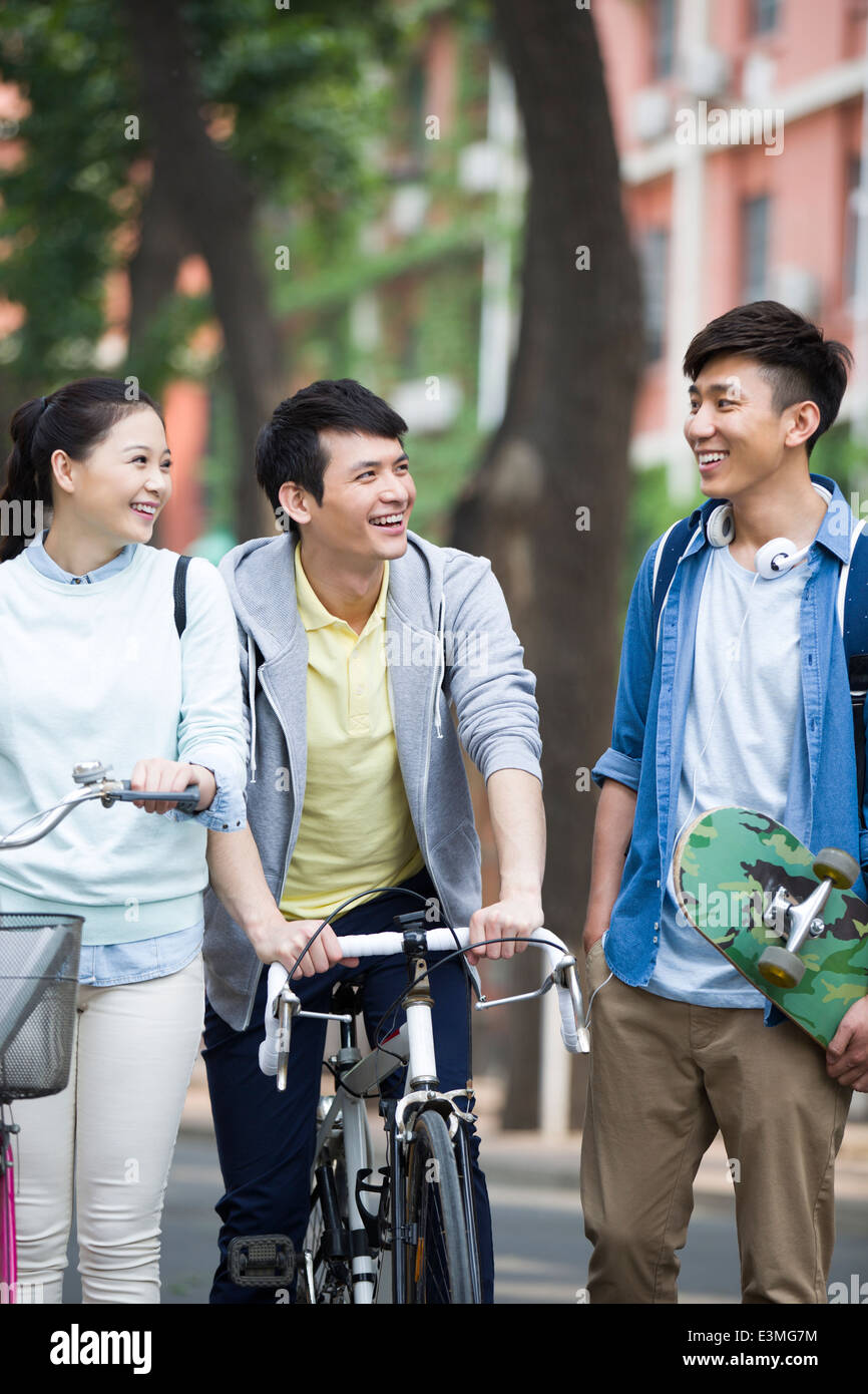 Happy college students on campus Stock Photo - Alamy