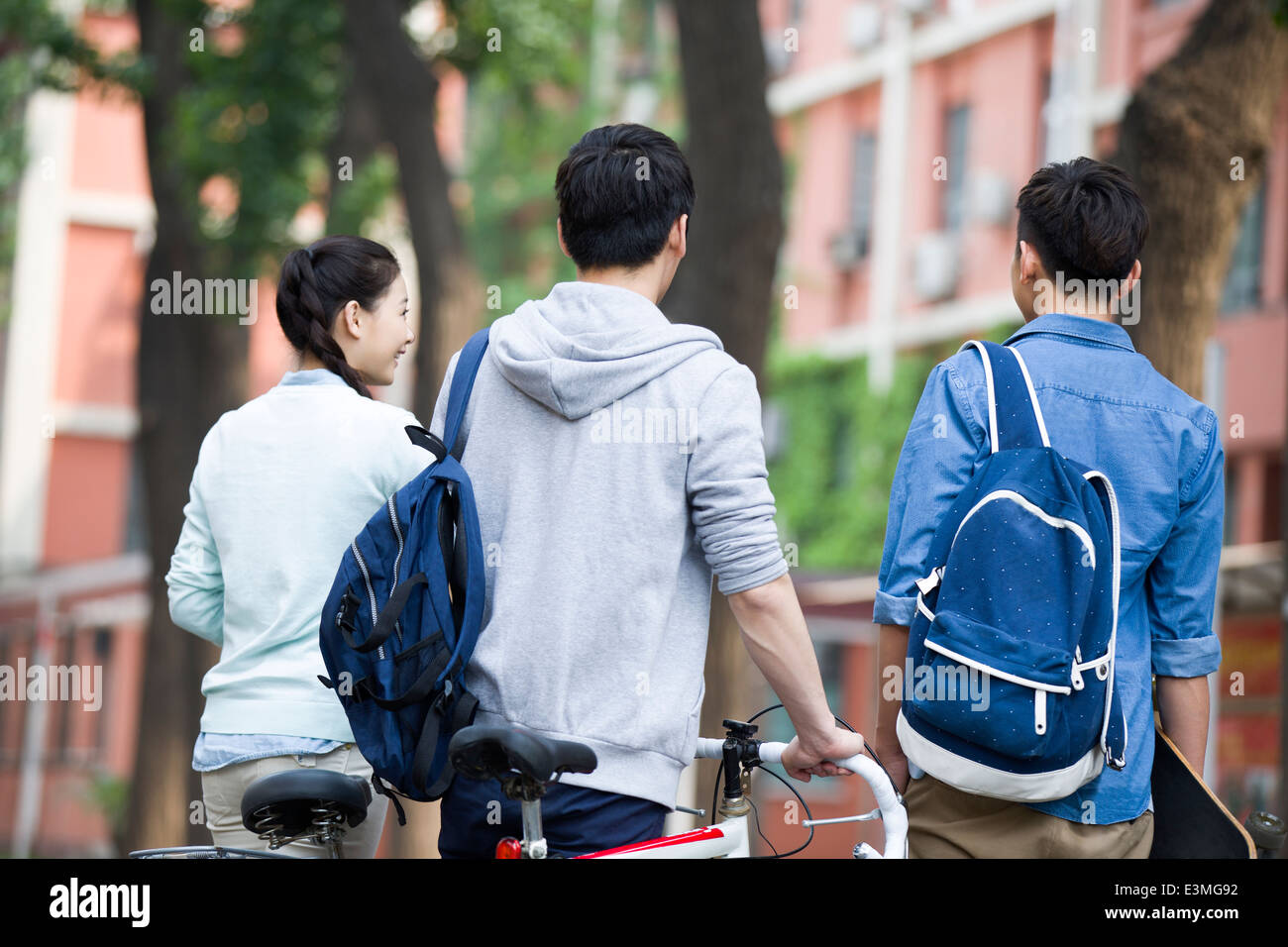 Happy college students on campus Stock Photo - Alamy