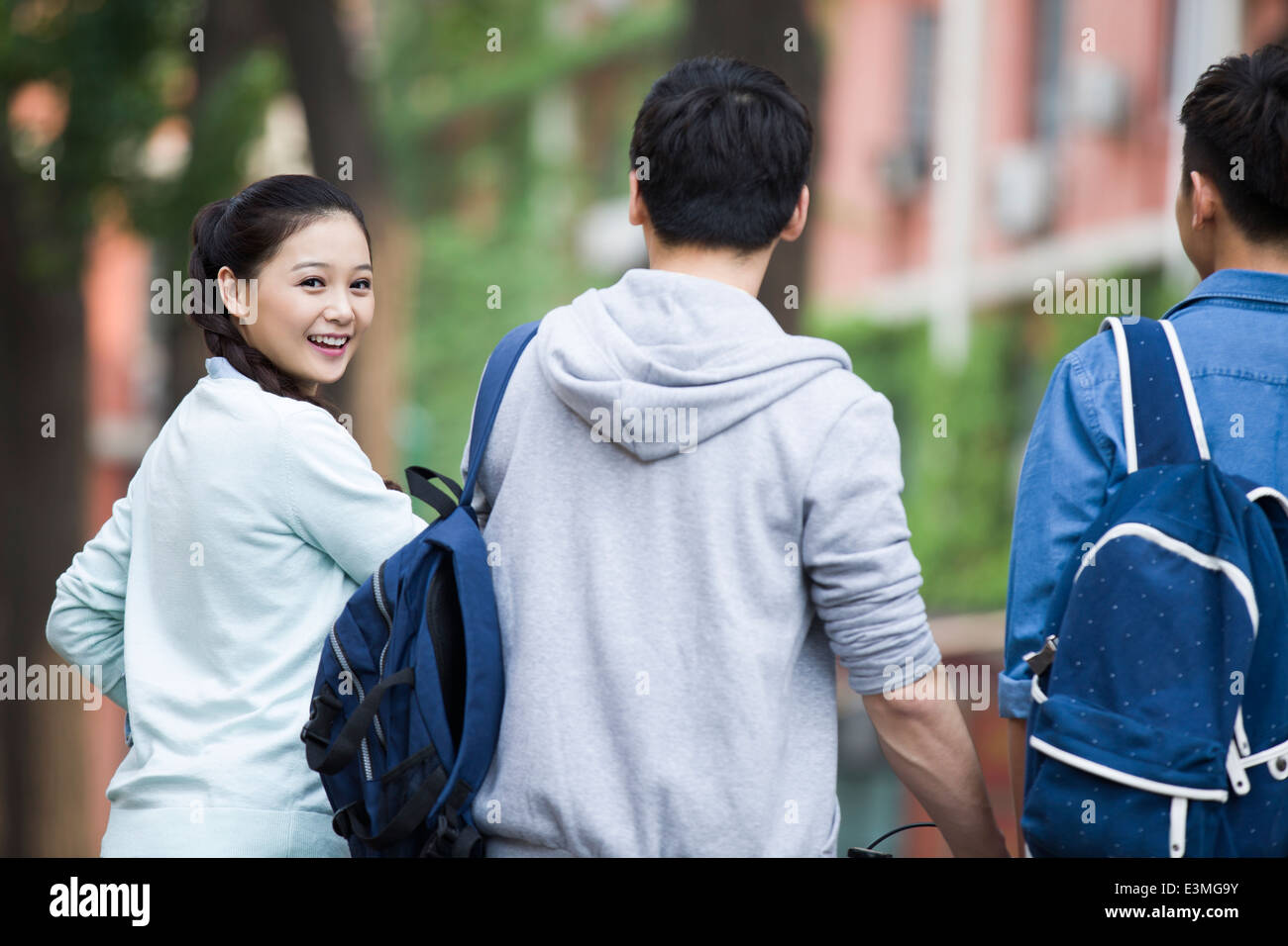 Happy college students on campus Stock Photo - Alamy