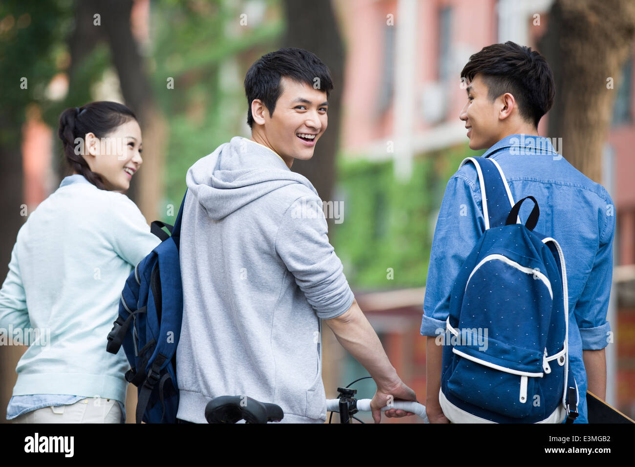 Happy college students on campus Stock Photo - Alamy
