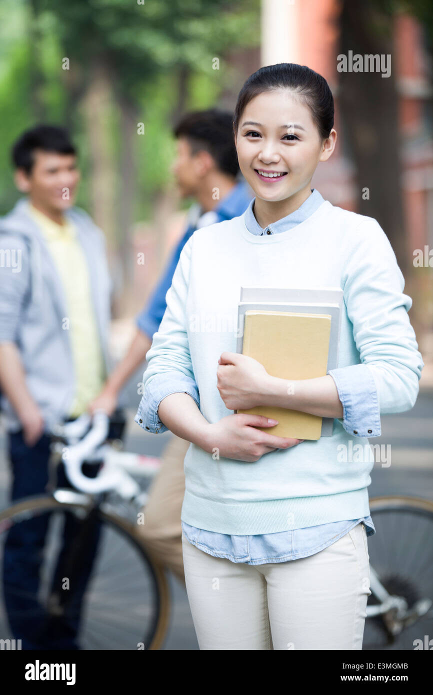 Happy college students on campus Stock Photo - Alamy