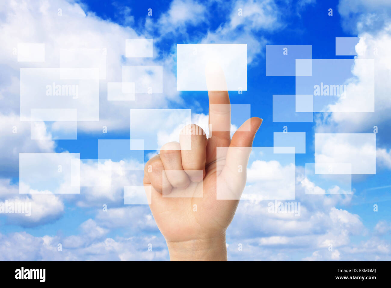 Cloud computing concept with woman hand on blue sky background Stock ...