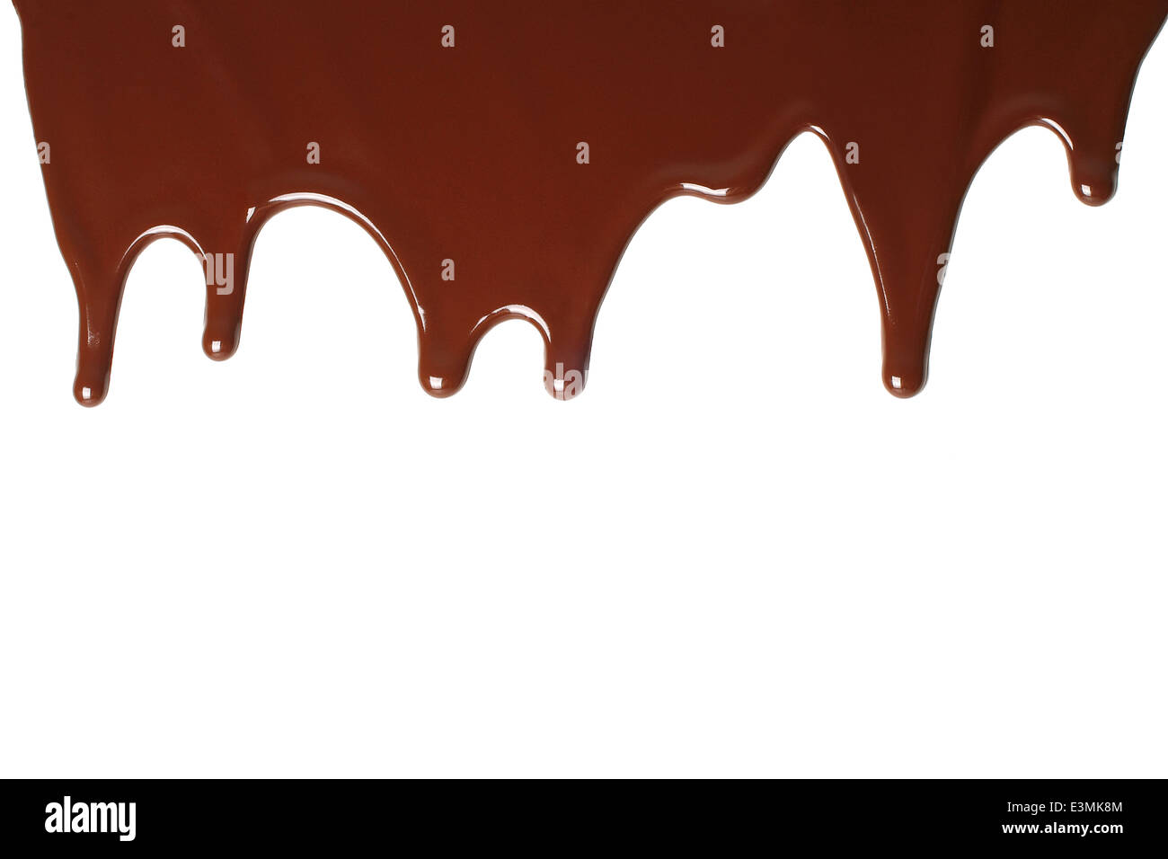 Melted chocolate dripping on white background Stock Photo - Alamy