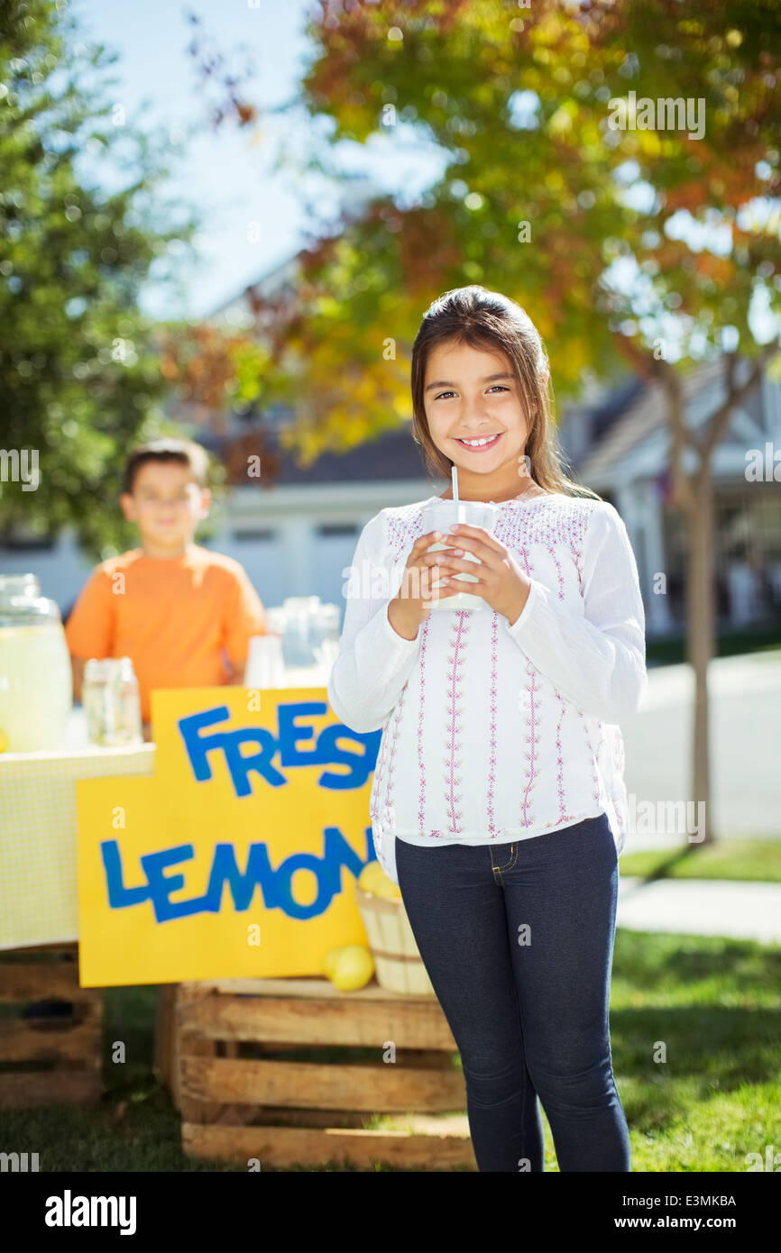 Portrait of smiling girl at lemonade stand Stock Photo - Alamy