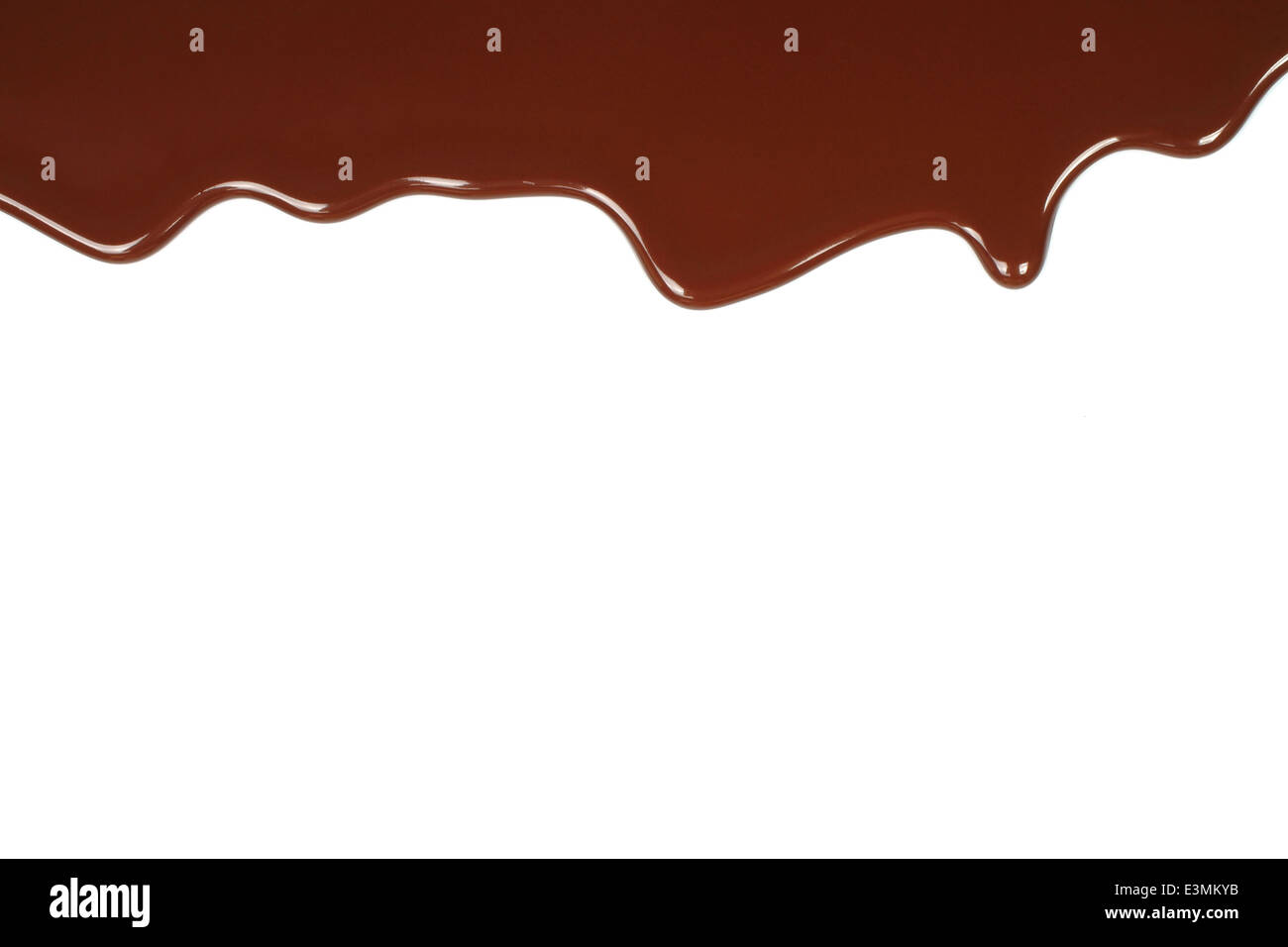 Melted chocolate dripping on white background Stock Photo - Alamy