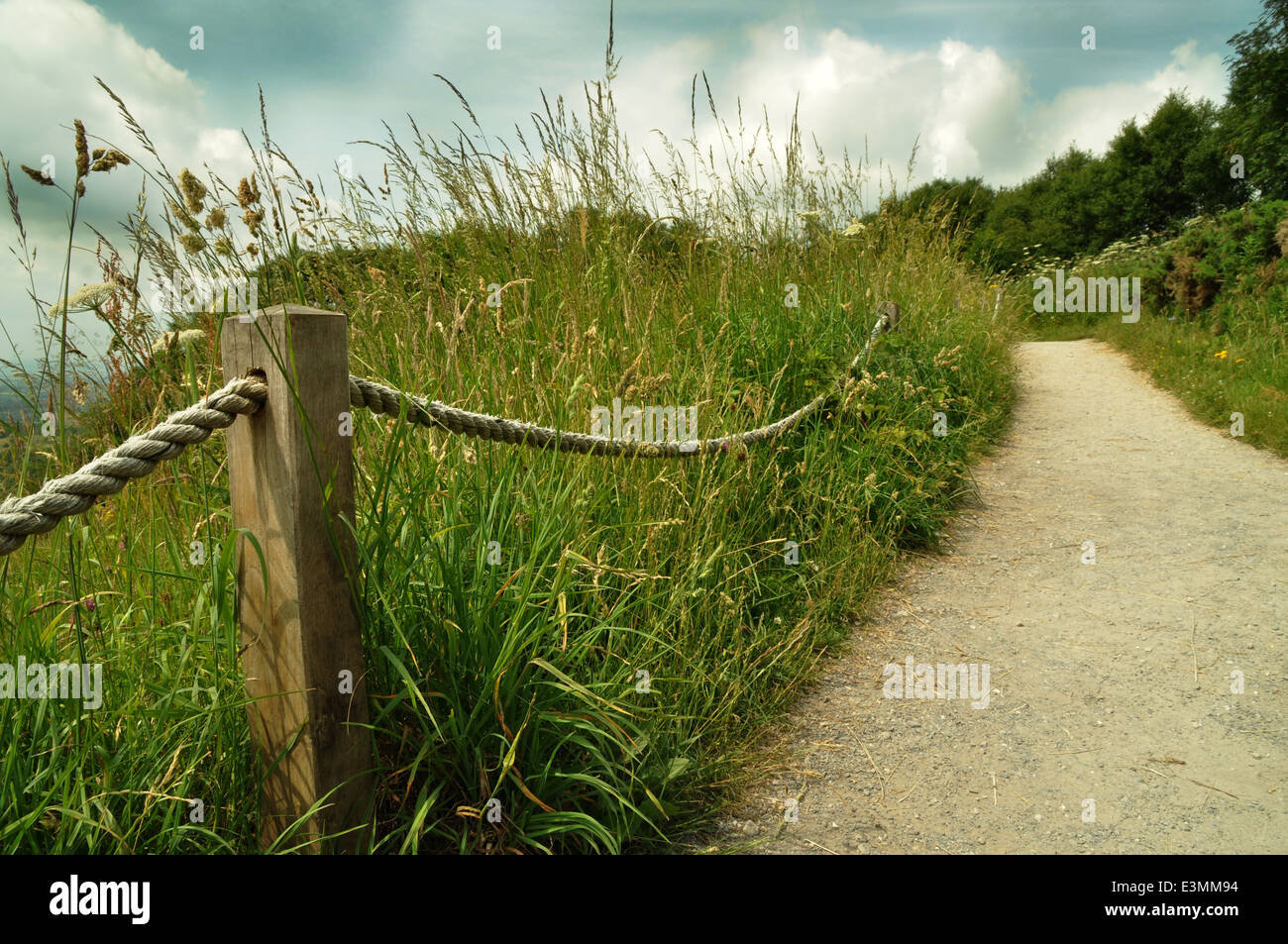Countryside pathway rope fence Stock Photo - Alamy
