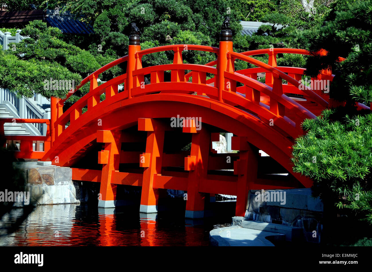 HONG KONG: A classic bright orange Chinese wooden bridge spans a lagoon ...