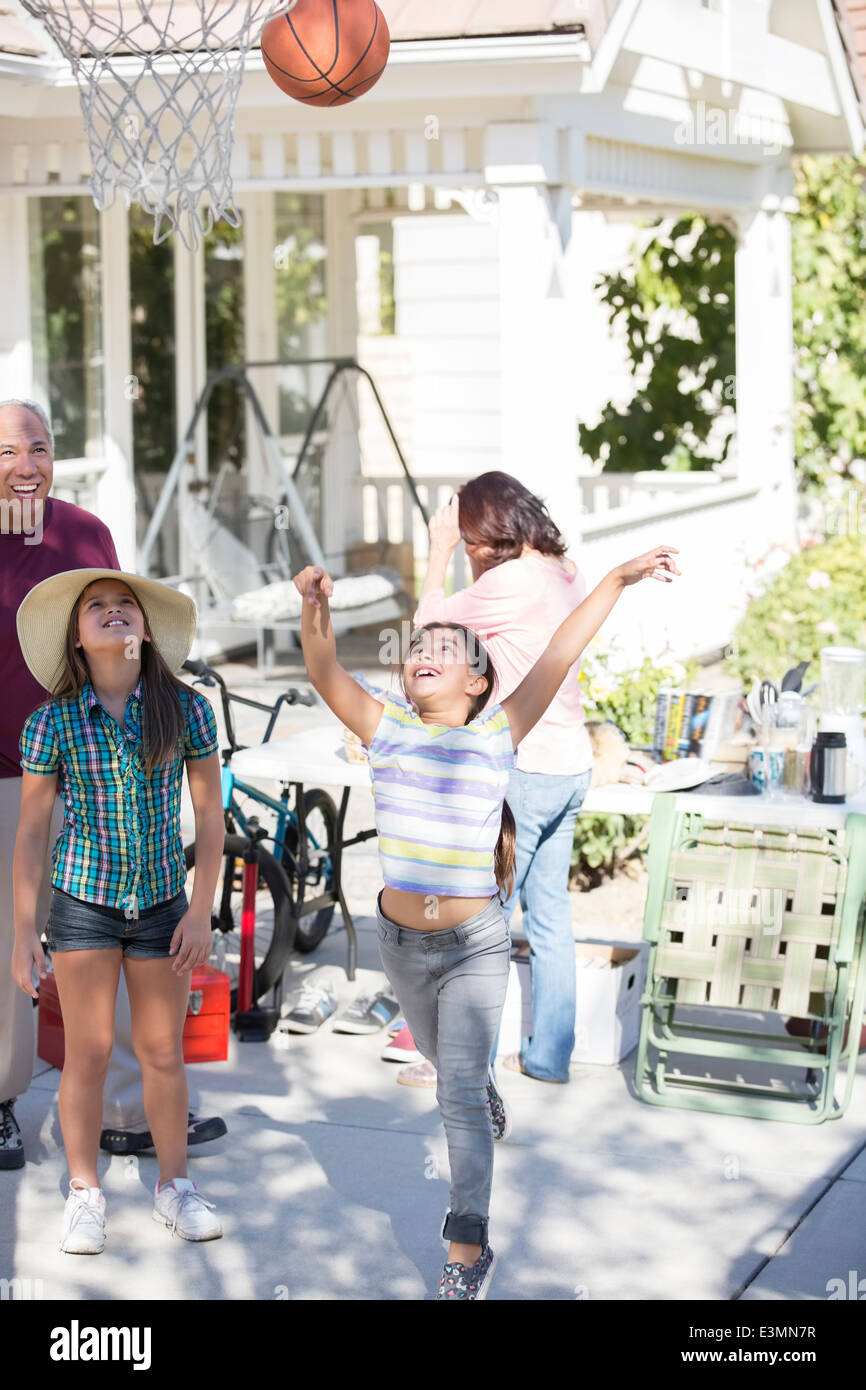 Grandparents watching granddaughters play basketball Stock Photo - Alamy