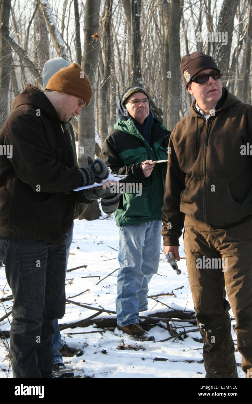 Brian Pember works with volunteers at the Mississippi River National ...
