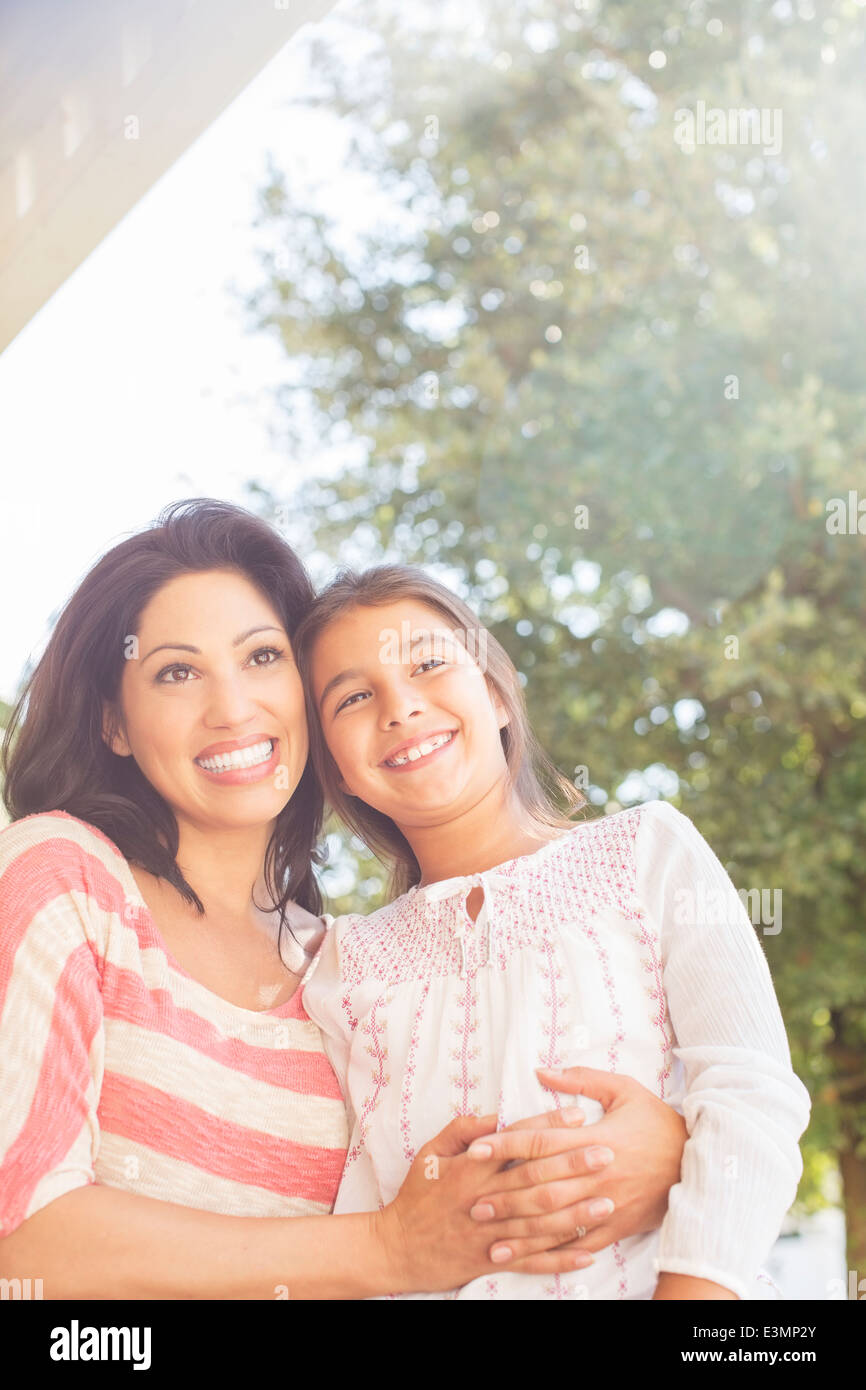 Mother daughter hugging outside hi-res stock photography and images - Alamy