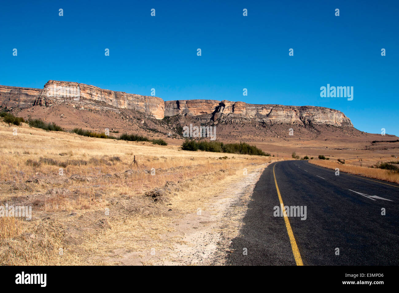 curved rural road with panoramic view of mountains Stock Photo - Alamy
