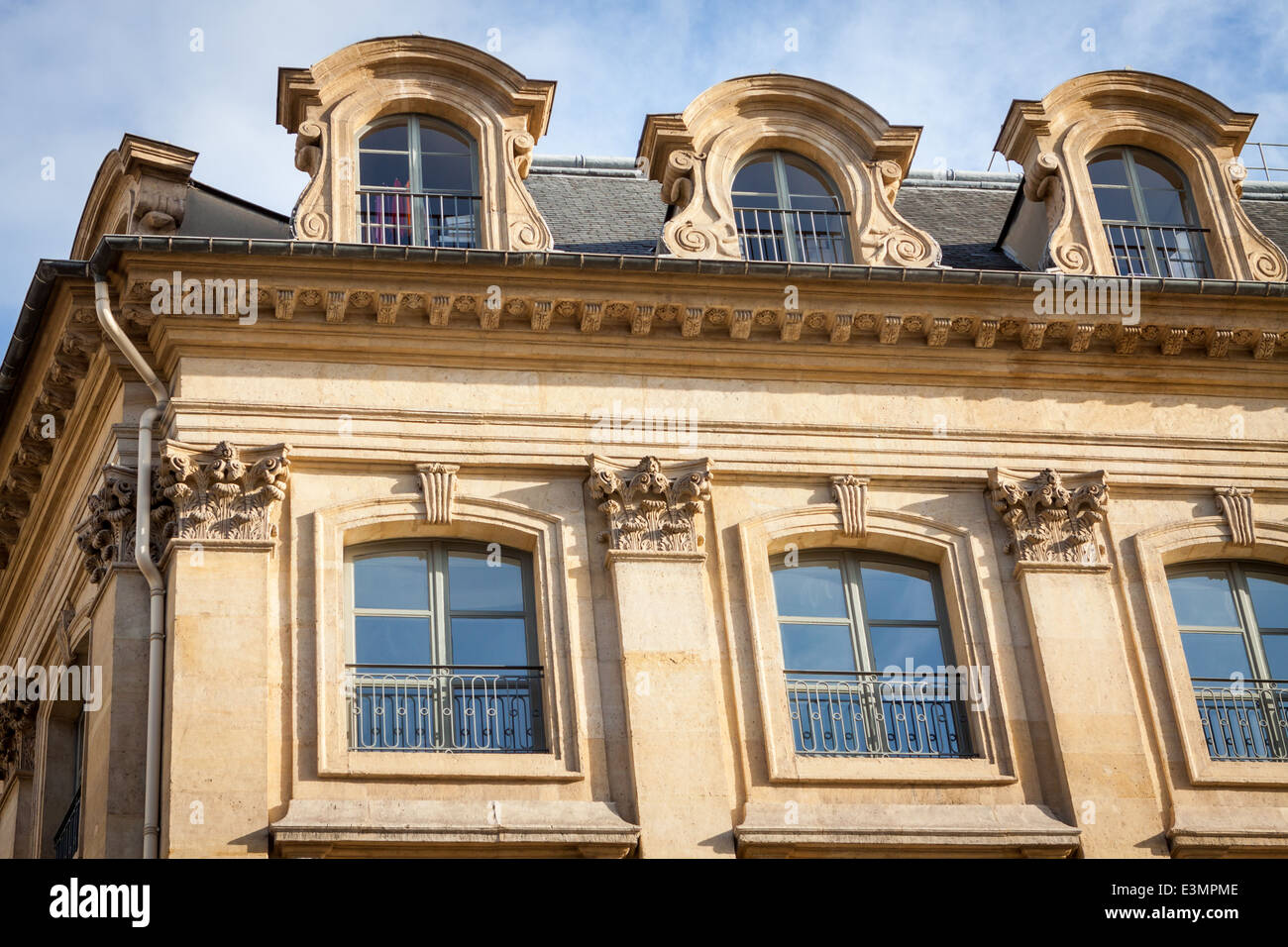 Exterior of a multi-storey historical townhouse in Paris with an ornate ...