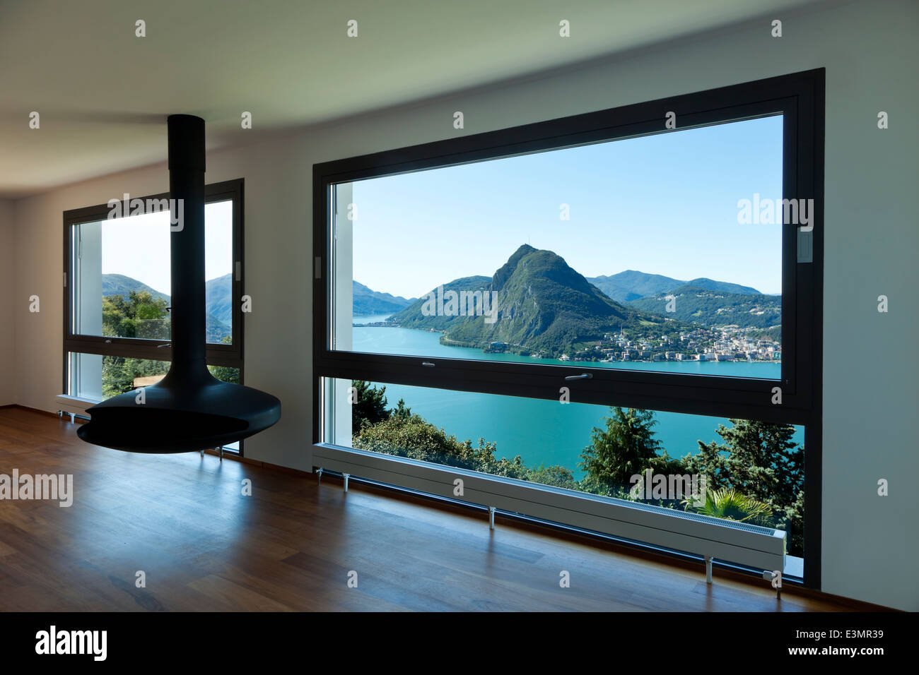 Modern apartment large living room with panoramic window Stock Photo ...