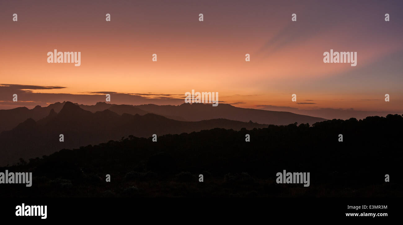 The last rays of sun over the African plains on the slopes of ...