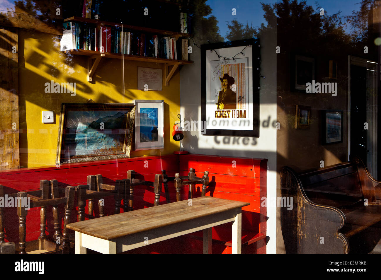 Empty closed cafe seen the window Stock Photo - Alamy