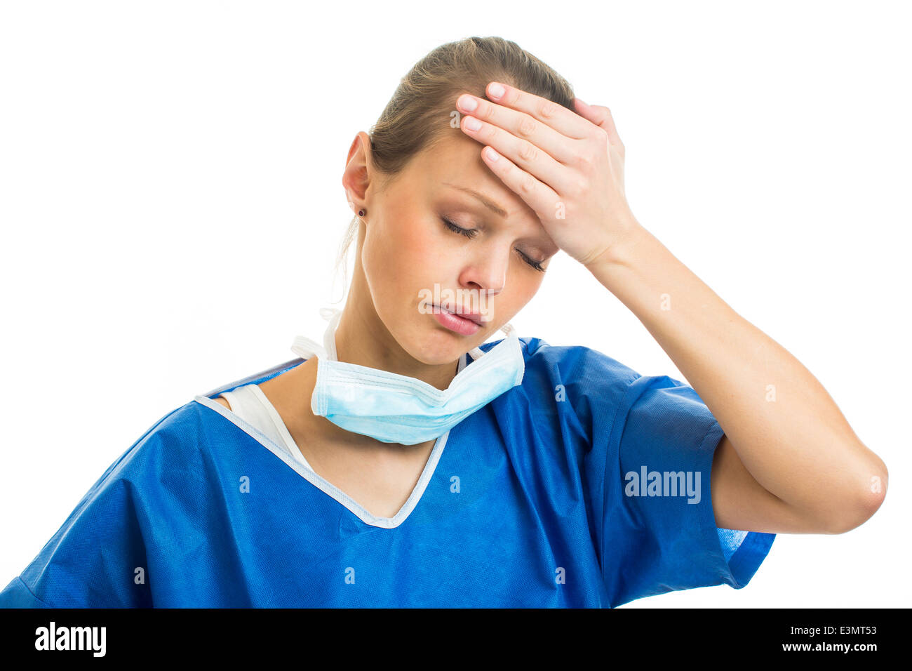 Portrait of a female doctor/surgeon feeling down, exhausted, frustrated ...