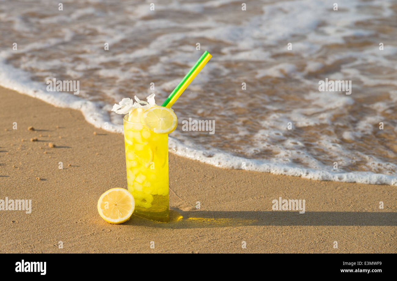 A freshly prepared cocktail on a sunny beach Stock Photo - Alamy