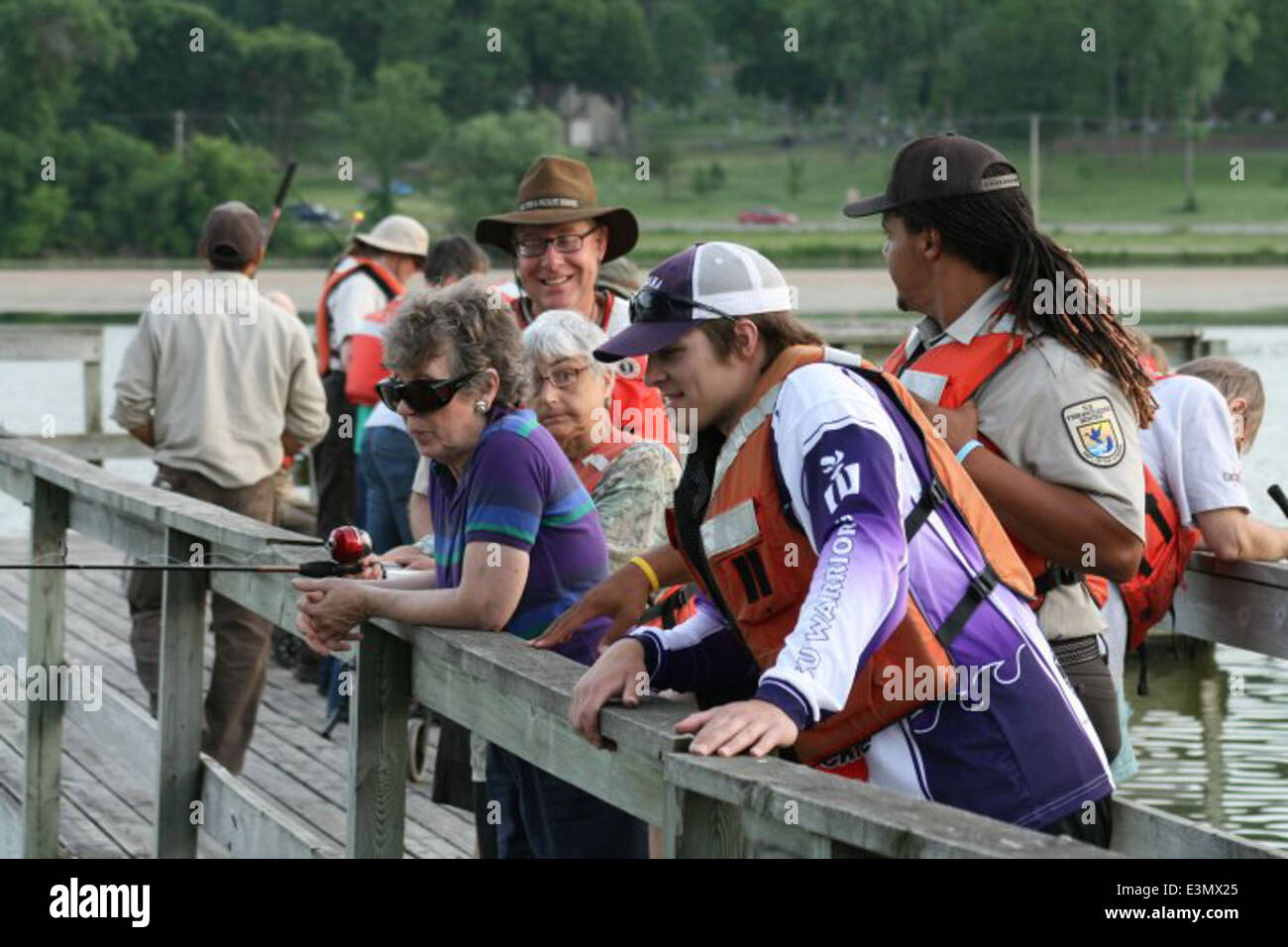 Winona District Staff and volunteers assist with fishing event Stock ...